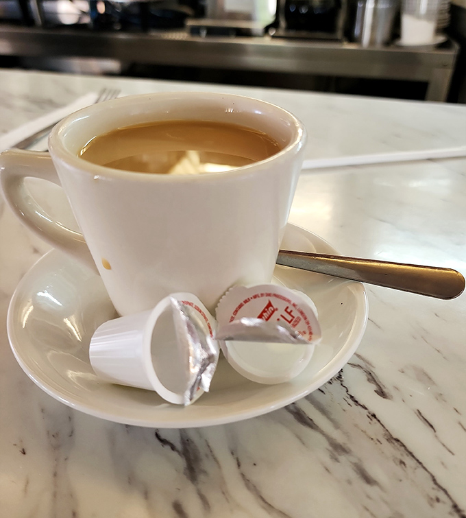 Coffee served diner-style: honest, straightforward, and ready to be refilled before you even realize you need it. The lifeblood of any proper diner experience. 