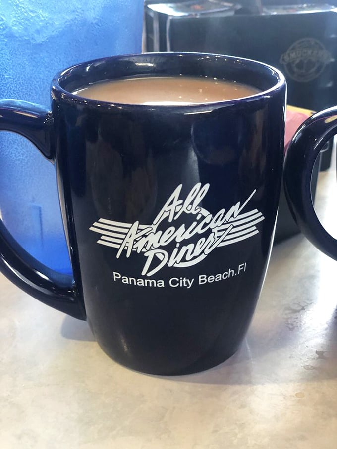 The diner's signature mug cradles coffee dark enough to see your future in, yet smooth enough to drink black.