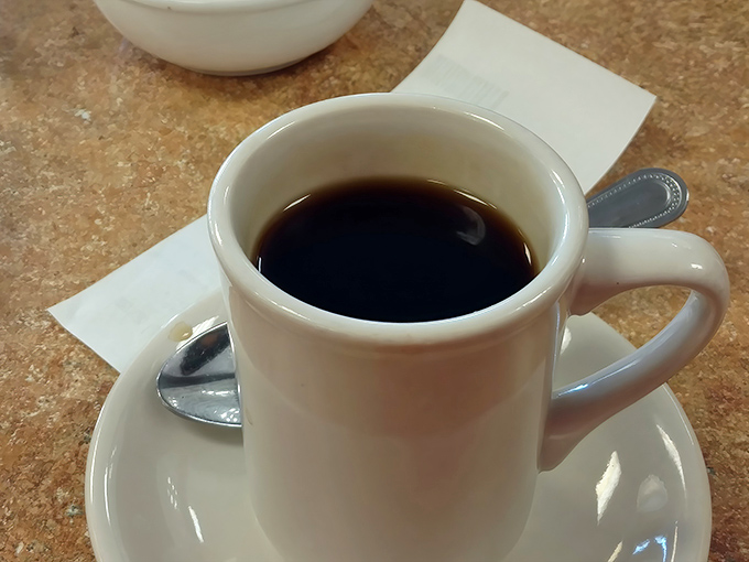 The humble diner coffee mug&mdash;America's real holy grail. Dark, honest brew that's fueled more conversations and road trips than any energy drink.