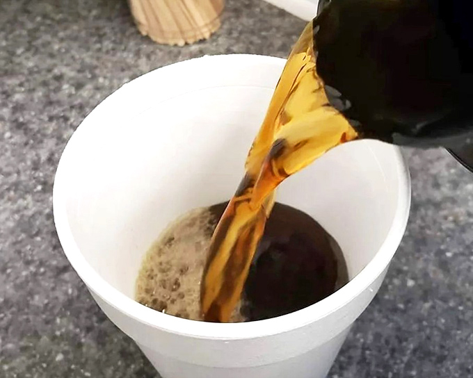 Coffee being poured with purpose &ndash; because even superheroes need sidekicks. The Robin to your donut's Batman.