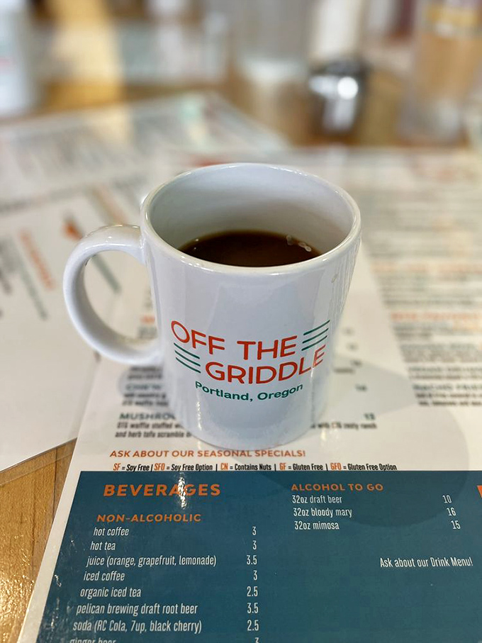 A simple coffee mug that promises liquid motivation. In Portland, even the caffeine delivery systems come with a side of local pride.