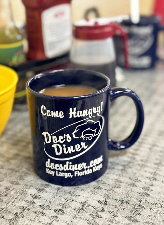 "Come Hungry!" isn't just a slogan on this navy blue mug &ndash; it's the best advice you'll get all day in Key Largo.