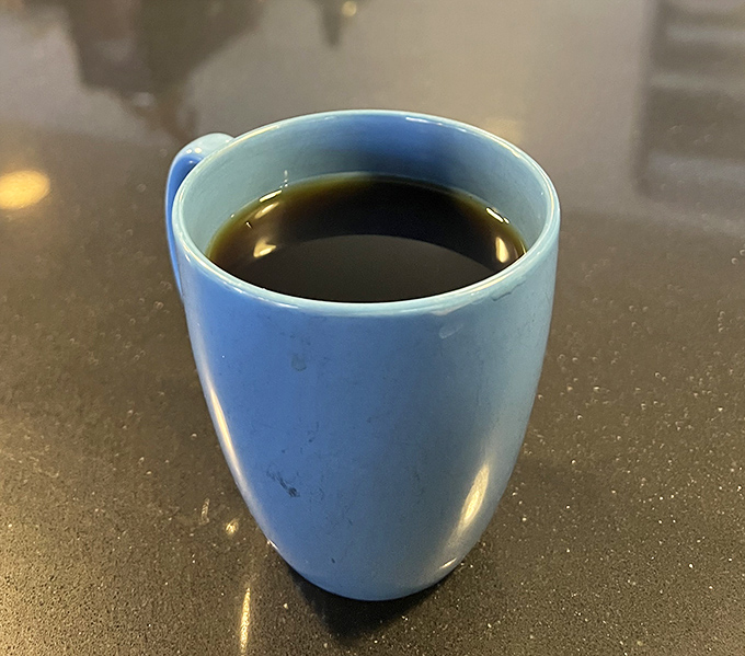 Orange crush in a frosty glass &ndash; because even seafood legends need the perfect liquid sidekick.