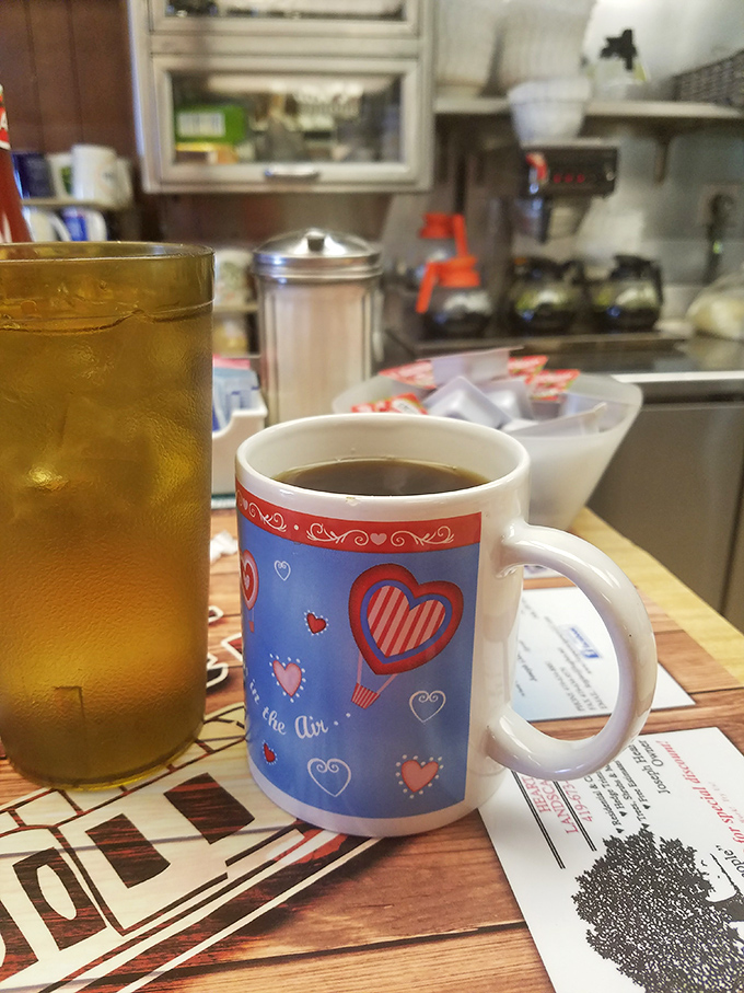 Coffee served in a mug with hearts—because at Midway, they understand that your morning caffeine isn't just a beverage, it's a love affair that deserves proper recognition.