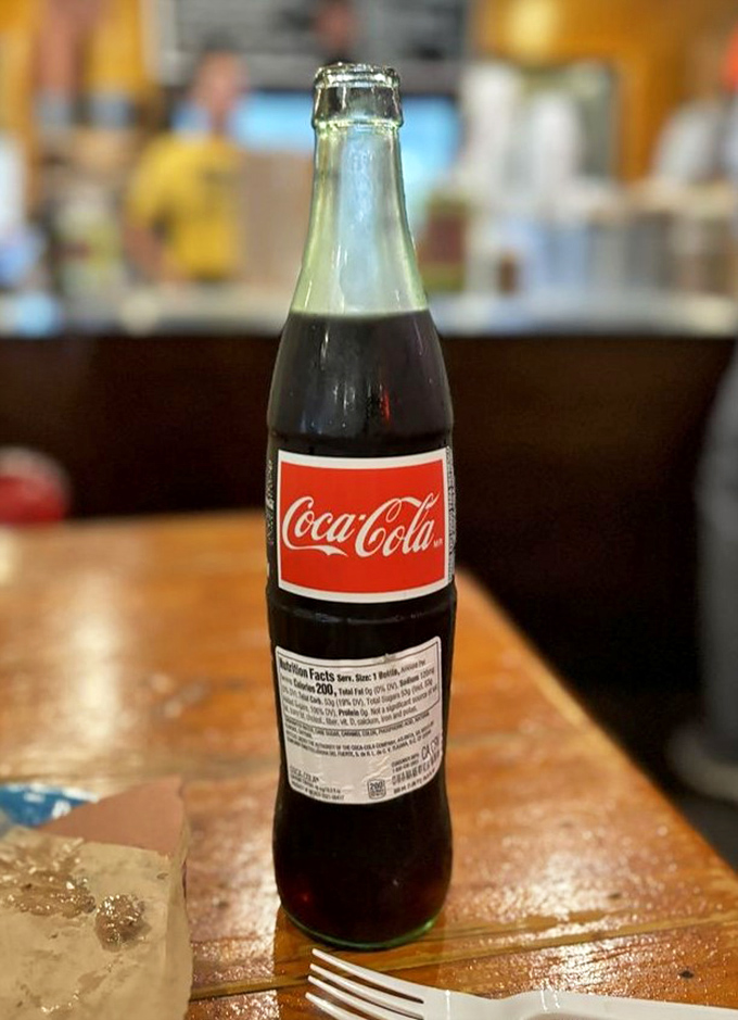 Glass bottles of Coke hit different when paired with smoke-kissed meat – it's science, probably.