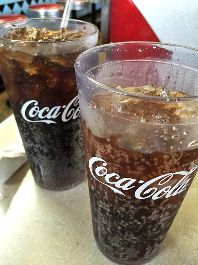 In a world of complicated craft beverages, there's something wonderfully nostalgic about an ice-cold Coca-Cola in a proper glass with that perfect fizz.