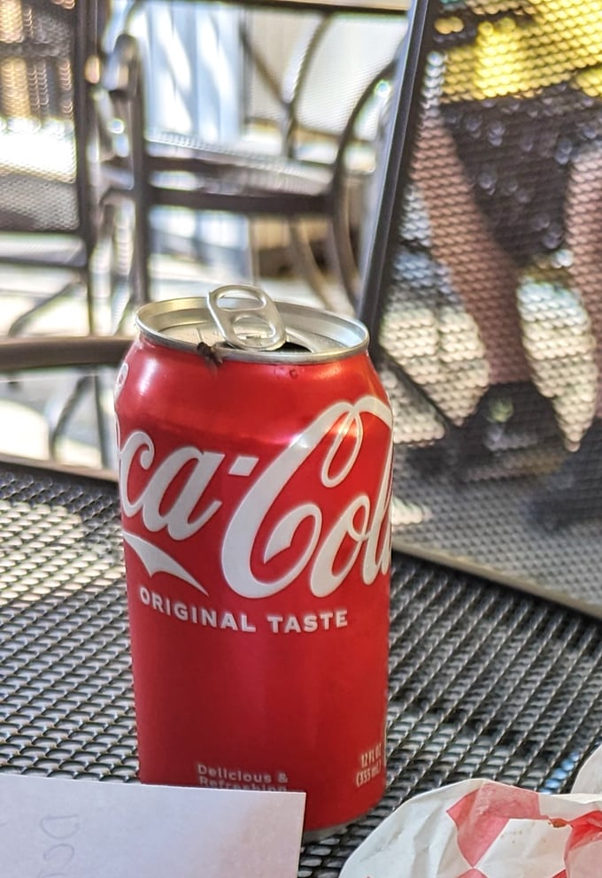 The perfect companion to a spicy tenderloin sandwich? The unchanged, reliable sweetness of a cold Coca-Cola in the classic can.