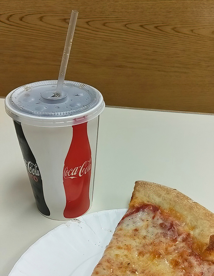 The classic companion to any Cenzo's feast&mdash;a fountain soda and slice combo that takes you back to simpler, happier times.