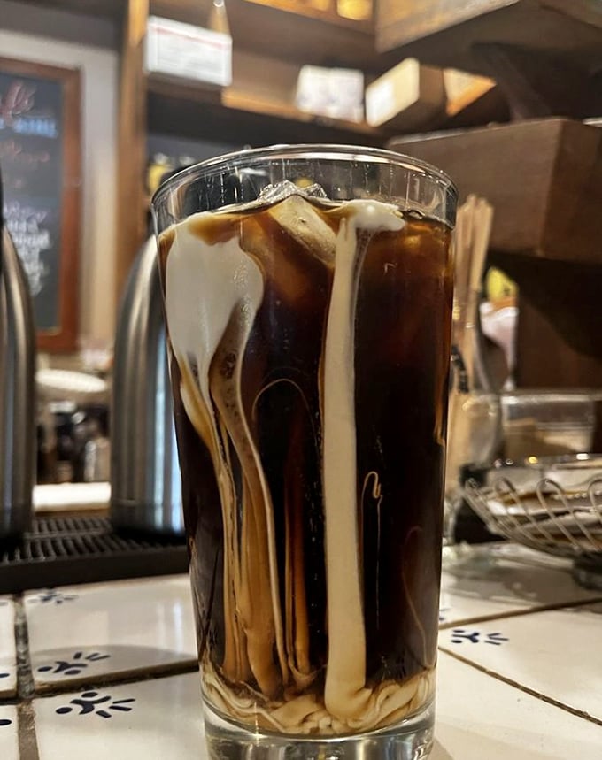 Coffee and cream performing their morning ballet in a glass&mdash;the kind of simple pleasure that makes Monday feel like Saturday.