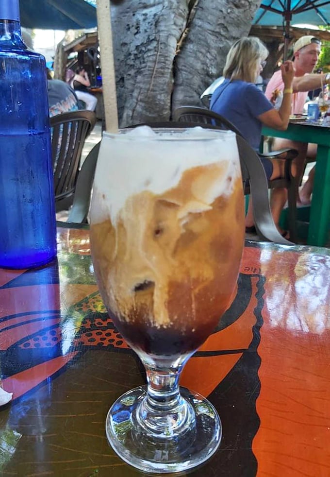 Cold glazed coffee that looks like liquid happiness swirled with cream, perfect for washing down all that incredible banana bread goodness.