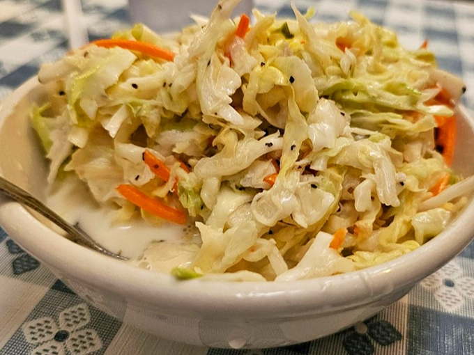 Fresh coleslaw provides the perfect cool counterpoint to all that glorious fried chicken heat you're about to experience.