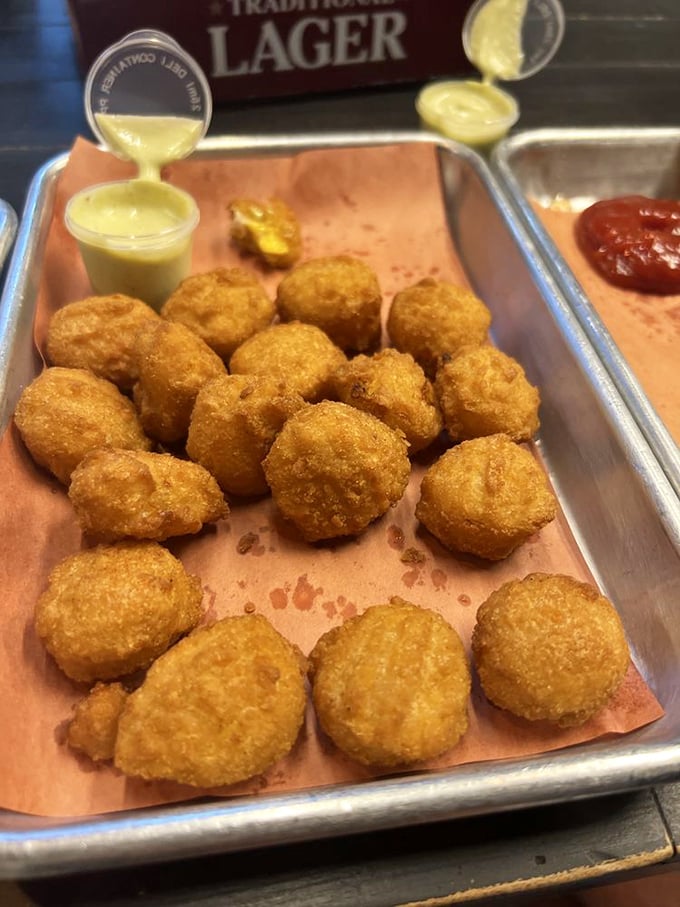 Golden-fried corn nuggets that crunch like your favorite childhood memory before melting into sweet, savory bliss.