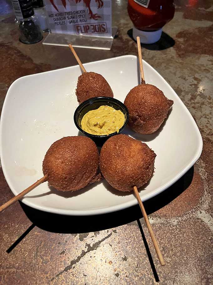 Corn dogs elevated from carnival fare to culinary delight. These golden-brown spheres of joy make you wonder why you ever settled for the stick version.