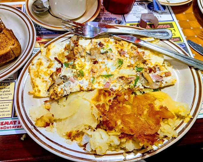 This isn't just an omelet &ndash; it's an edible treasure map where X marks the spot for every delicious ingredient hiding inside.