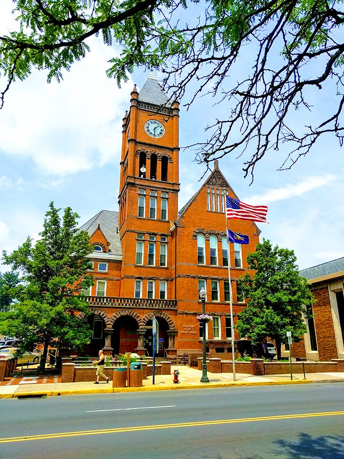 The courthouse's distinctive orange brick and soaring clock tower have witnessed countless town celebrations, political debates, and everyday moments of justice.