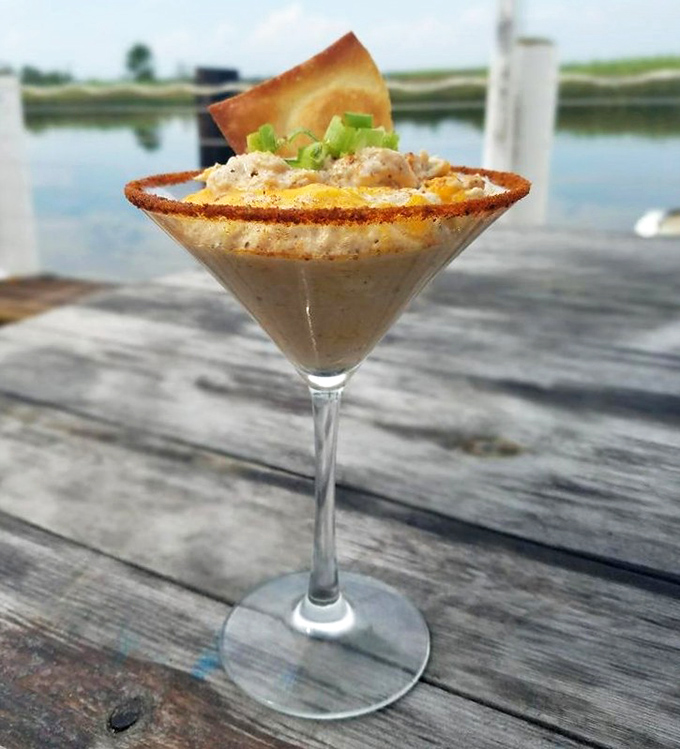 This martini glass isn't holding a cocktail&mdash;it's showcasing crab dip with the waterfront view providing the perfect garnish.