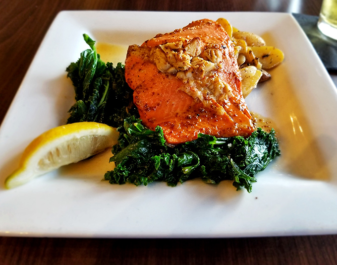 Salmon that looks like it just swam upstream to land on your plate. The vibrant color and perfect sear promise flavors that live up to the presentation.