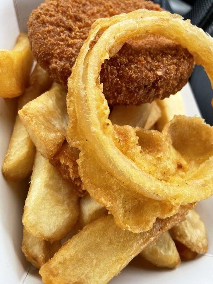 This isn't just a crab cake; it's a masterclass in seafood simplicity. The crispy exterior gives way to sweet, delicate crab meat within.