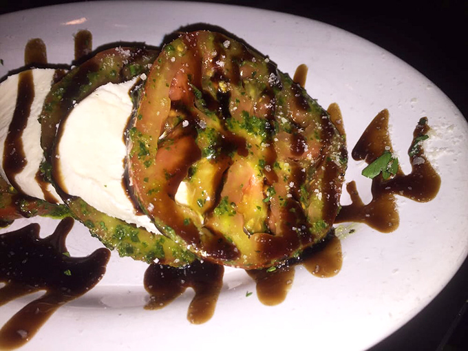 Not your average caprese&mdash;this grilled avocado with fresh mozzarella and balsamic reduction proves that sometimes tradition needs a delicious plot twist.