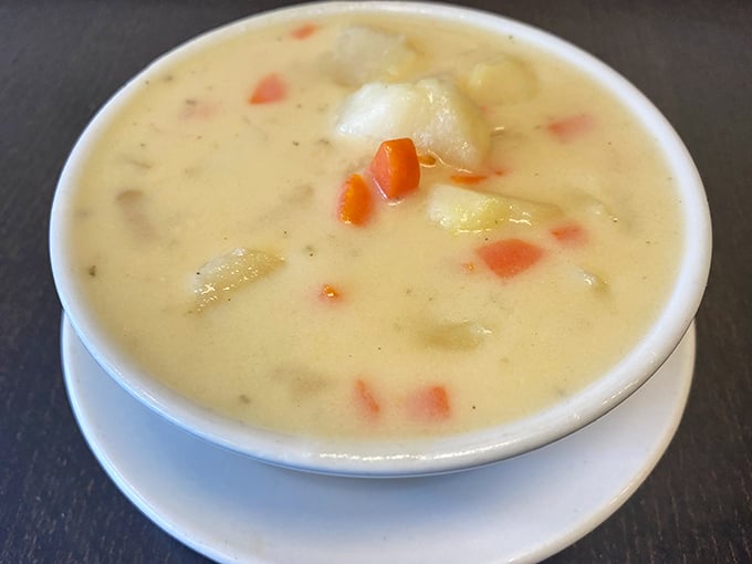 Cream of potato soup that looks like it was ladled straight from grandma's pot. Each spoonful probably comes with a story and definitely comes with comfort.