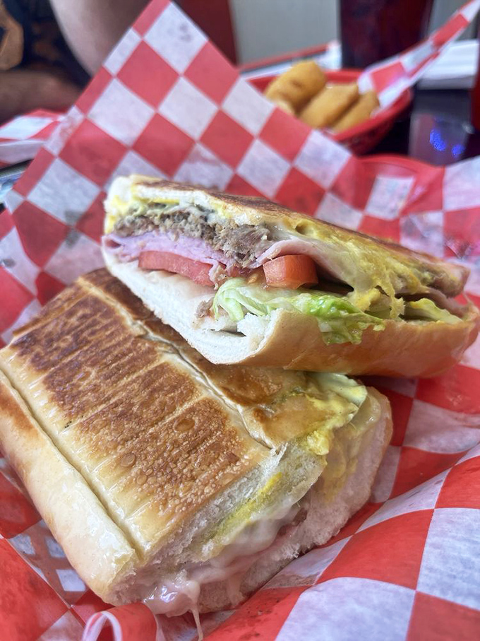 This Cuban sandwich isn't just pressed—it's been persuaded into a state of melty, meaty perfection that would make Miami proud.