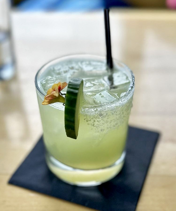This cucumber basil margarita isn't just a drink&mdash;it's a vacation in a glass. The salt rim is your passport to relaxation.