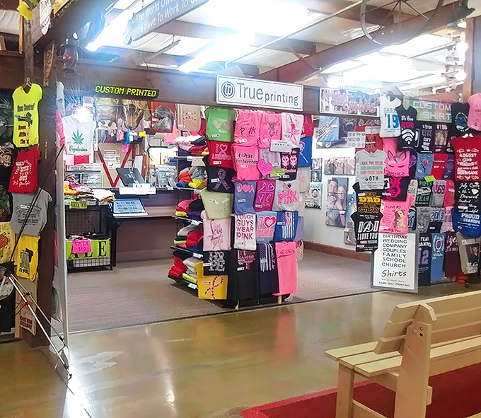 Custom t-shirts bloom like neon flowers in this printing shop, where your wildest slogan ideas become wearable conversation starters.