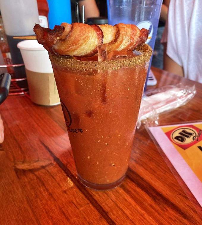 The Bloody Mary that ate breakfast. When your cocktail comes with bacon, it's not just a drink—it's a lifestyle choice worth celebrating.