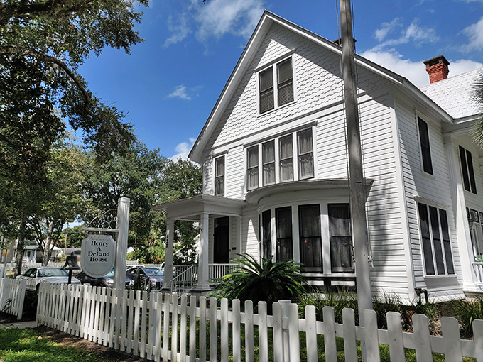 The DeLand House Museum stands as a pristine example of Victorian architecture, complete with the white picket fence of retirement dreams.