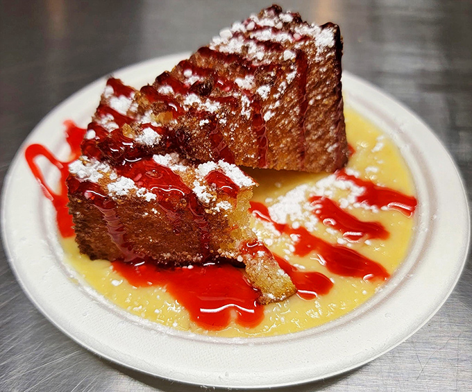 Deep-fried cornbread swimming in sweet sauce&mdash;proof that dessert at a barbecue joint isn't an afterthought, it's the encore performance.