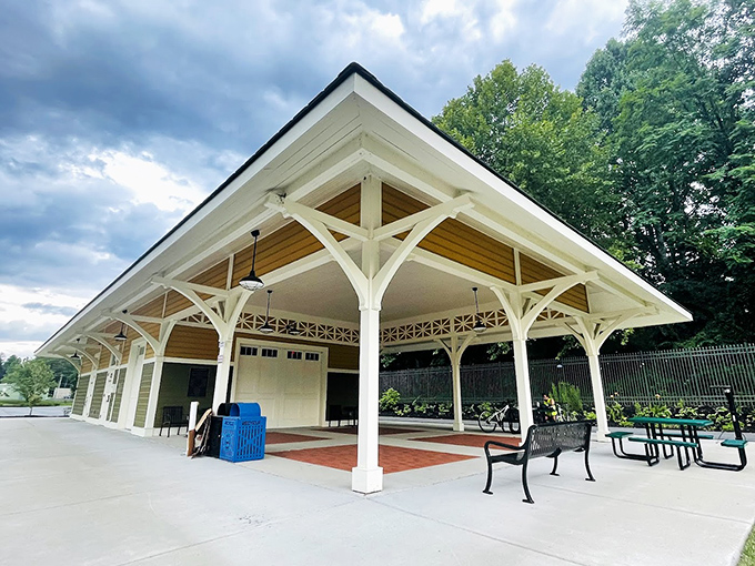 This elegant pavilion offers shelter from summer storms and winter chills, its crisp white columns bringing a touch of Southern charm to outdoor gatherings.