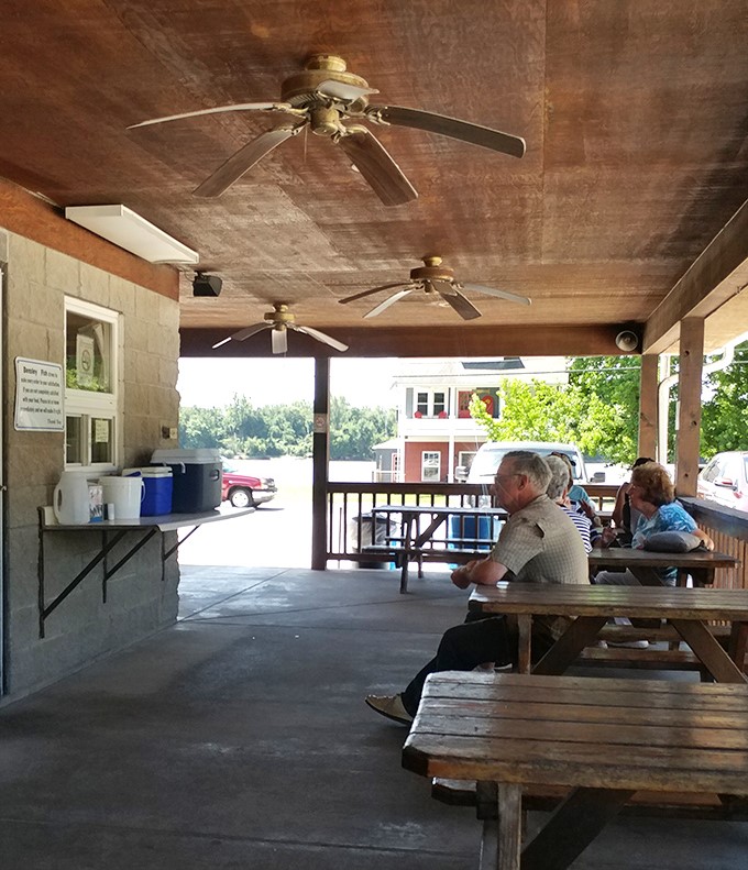 The covered porch &ndash; where strangers become friends over shared tables and the universal language of "mmm, try this."