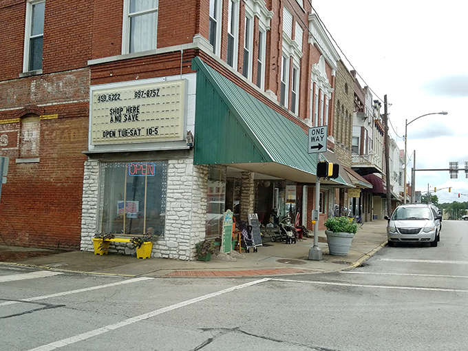 Stroll down these historic sidewalks and you'll find treasures like this vintage storefront, where "Shop Here and Save" isn't just a slogan&mdash;it's a promise.