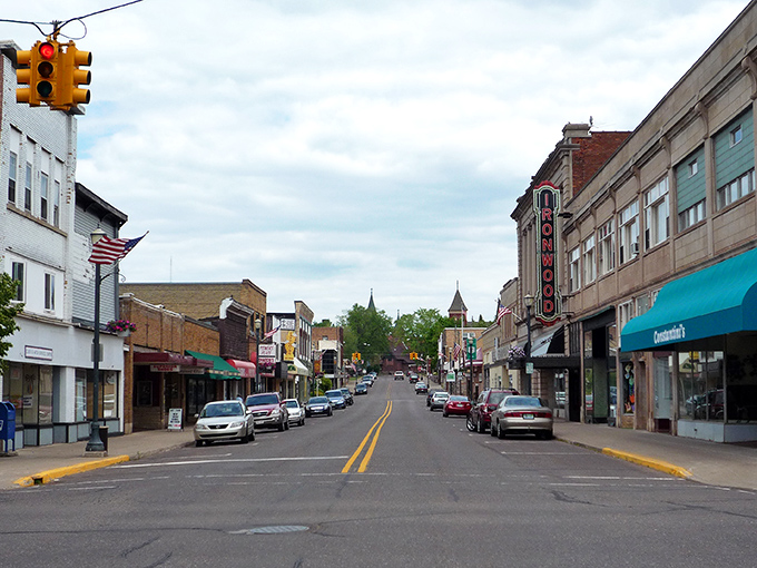 Downtown Ironwood's historic facades frame a street where people still window-shop and the theater marquee remains the brightest light on the block.