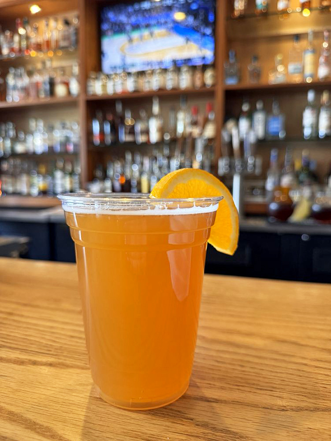 Sweet tea with an orange slice&mdash;the unofficial champagne of the South, served in a plastic cup that somehow makes it taste even more authentic.