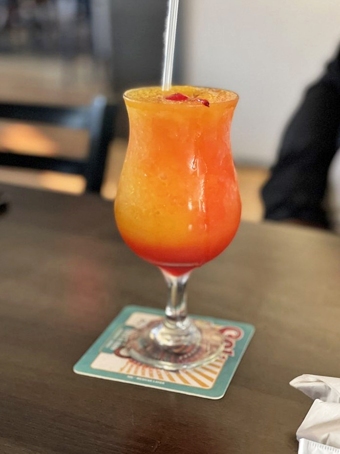 This sunset-in-a-glass cocktail isn't just a drink&mdash;it's vacation therapy. One sip and you're mentally booking a cabana somewhere tropical. 