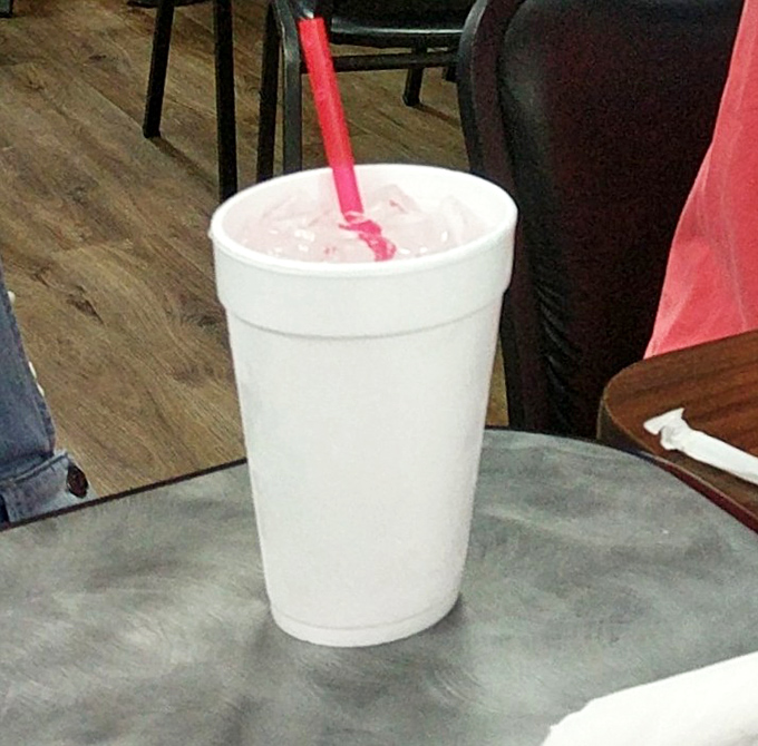 Sometimes happiness comes in a simple styrofoam cup with a bright straw, promising cold, creamy relief from Tennessee summer heat.
