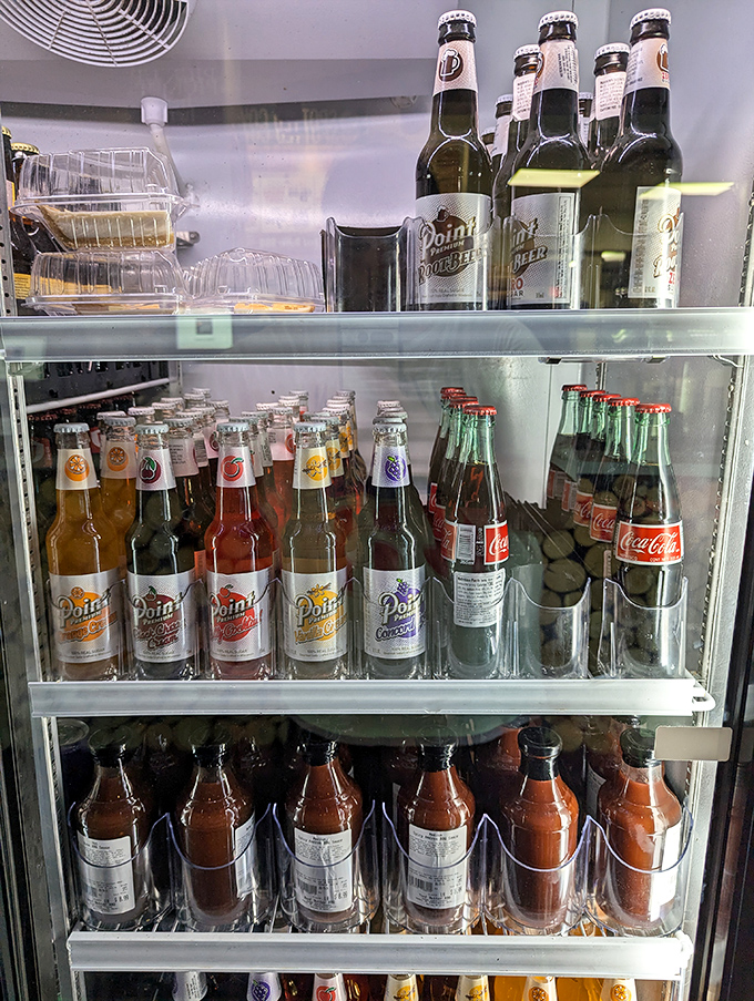 The beverage cooler offers Wisconsin's own Point Beer alongside the usual suspects &ndash; because good BBQ deserves proper hydration options.