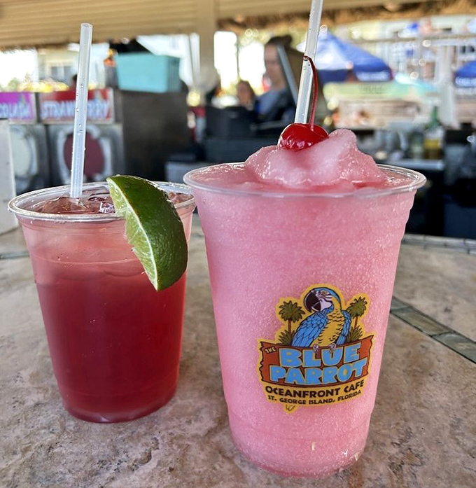 Frozen cocktails that taste like vacation decisions at their finest&mdash;the pink one practically screaming "you're not checking email today."