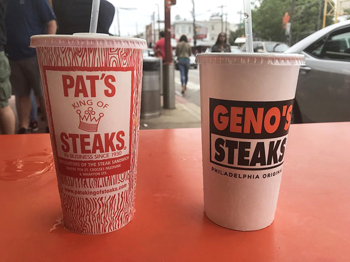 The cups tell the tale of the city's greatest rivalry. Like Yankees-Red Sox, but with better food and more passionate debates.