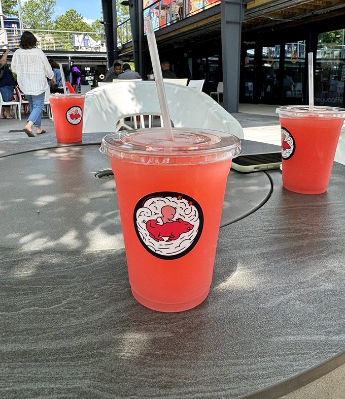 These vibrant red drinks aren't just refreshing&mdash;they're strategic palate cleansers between bites of smoky goodness. Hydration with style points. 