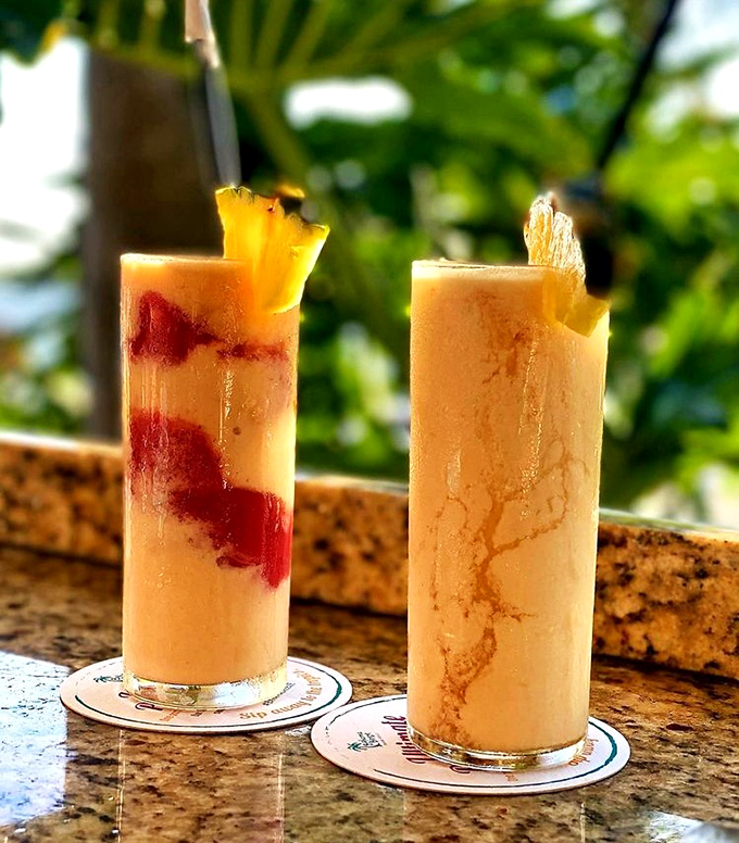Tropical cocktails that look like liquid sunshine, garnished with pineapple and promising to transport you to island time with just one sip.