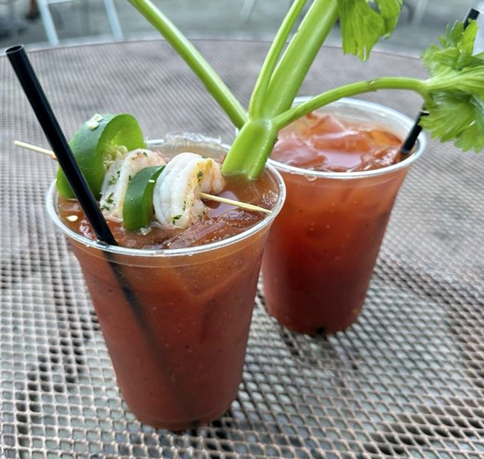 Bloody Marys garnished like they're auditioning for a food magazine cover. These aren't just drinks&mdash;they're liquid appetizers with attitude.