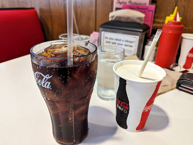 In a world of complicated craft beverages, there's something refreshingly honest about a classic Coca-Cola alongside your burger feast.