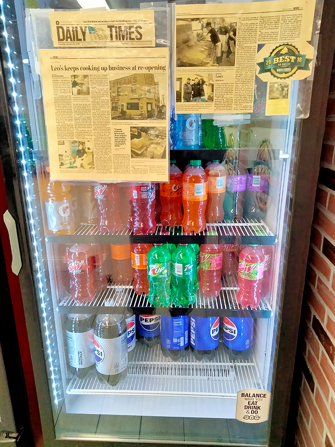 The beverage cooler &ndash; where colorful sodas stand ready to battle the salt and spice of your sandwich selection.