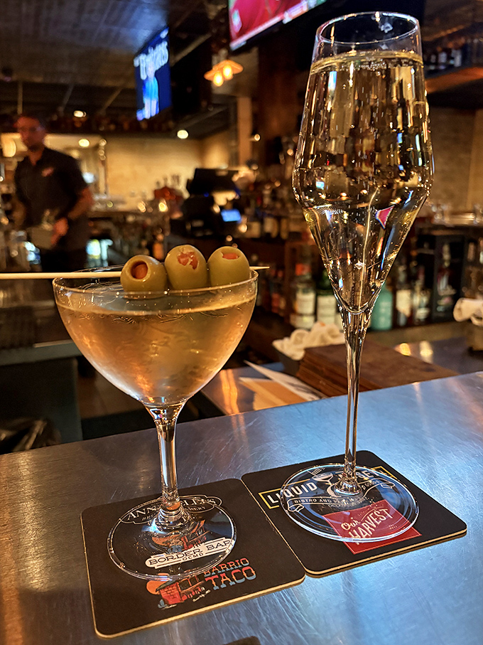 Martini with olives meets champagne flute &ndash; the beginning of stories you'll tell tomorrow. Sophisticated sipping in a setting that encourages lingering.