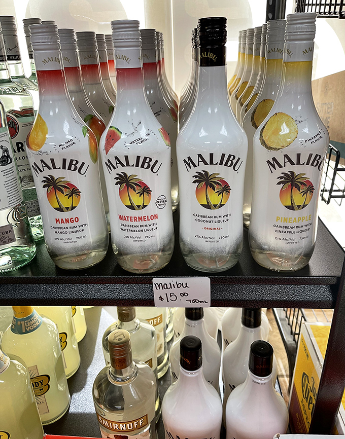 Malibu bottles standing at attention, because sometimes tropical vibes complement Maryland crabs perfectly &ndash; who knew?