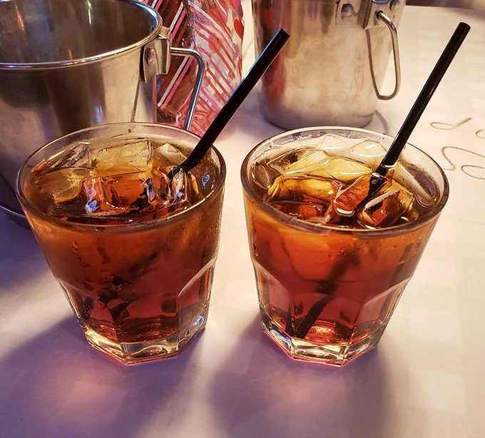Two glasses of sweet tea so perfectly amber they could be mistaken for liquid topaz&mdash;the unofficial state beverage of Florida, served properly iced and ready for sipping.