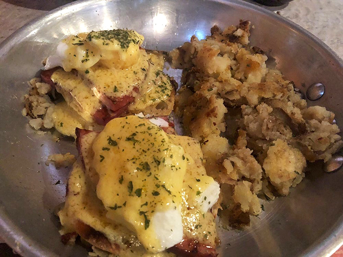 Eggs Benedict that's dressed for success&mdash;the hollandaise draped over everything like a yellow velvet robe, with home fries playing the perfect supporting role.