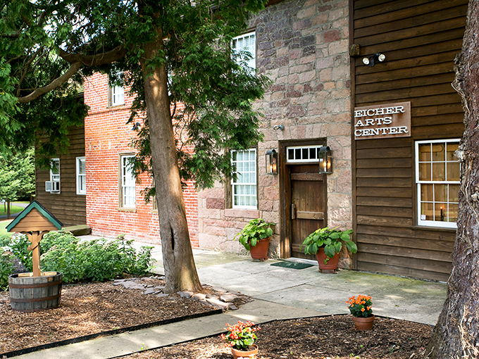 The Eicher Arts Center blends rustic charm with cultural significance, its stone walls housing creativity that bridges centuries of artistic expression.